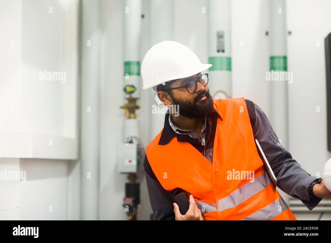 heating engineer checking system Stock Photo - Alamy
