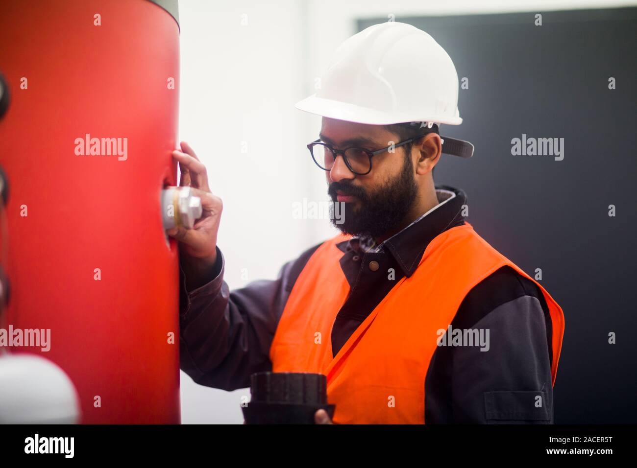 heating engineer checking system Stock Photo - Alamy