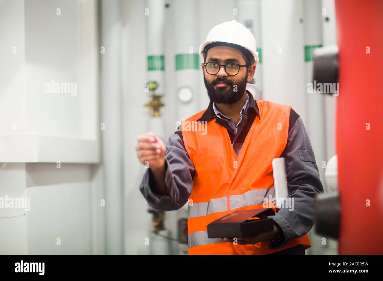 heating engineer checking system Stock Photo - Alamy