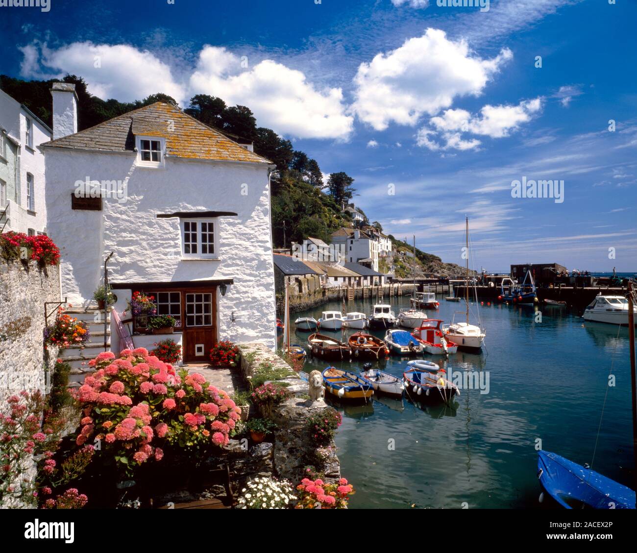 Cottages by a harbour. Photographed in Polperro, Cornwall, UK Stock ...