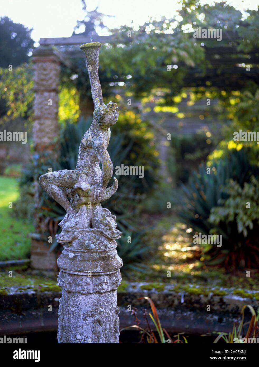 Garden statue water feature. Photographed in the UK, in December Stock ...