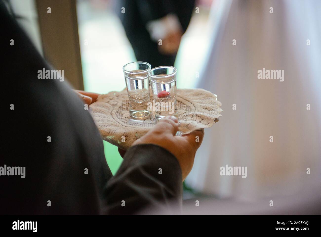 Traditional polish greeting the bride and groom by the parents with ...