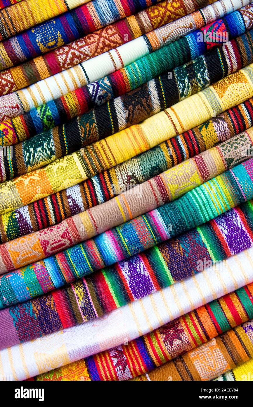 Traditional Ecuadorian fabrics on a market stall in Otavalo, Northern ...
