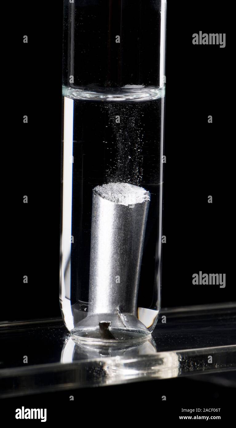 Iron reacting with hydrochloric acid. This reaction leads to the ...