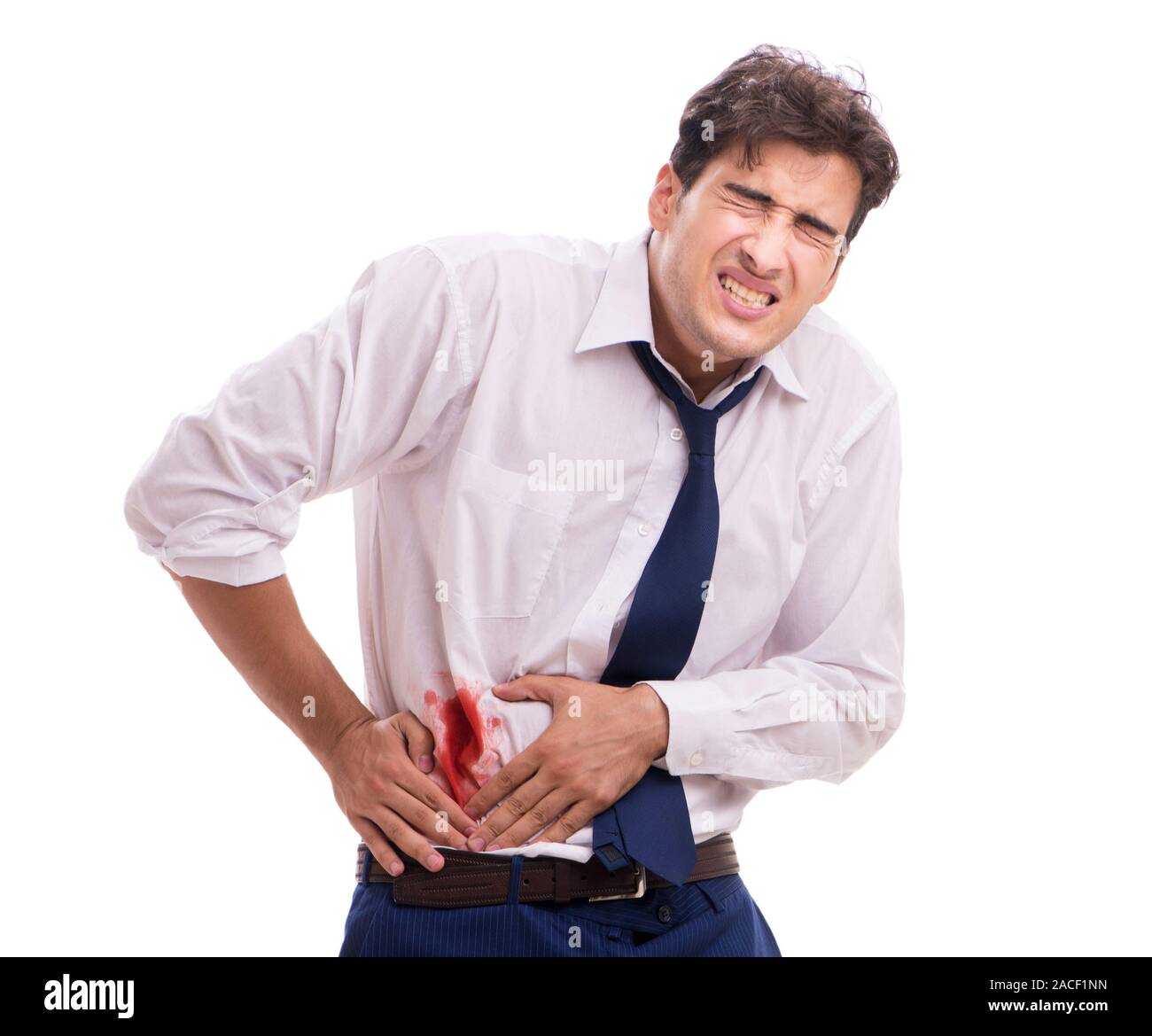 Wounded businessman with blood stains isolated on white background ...