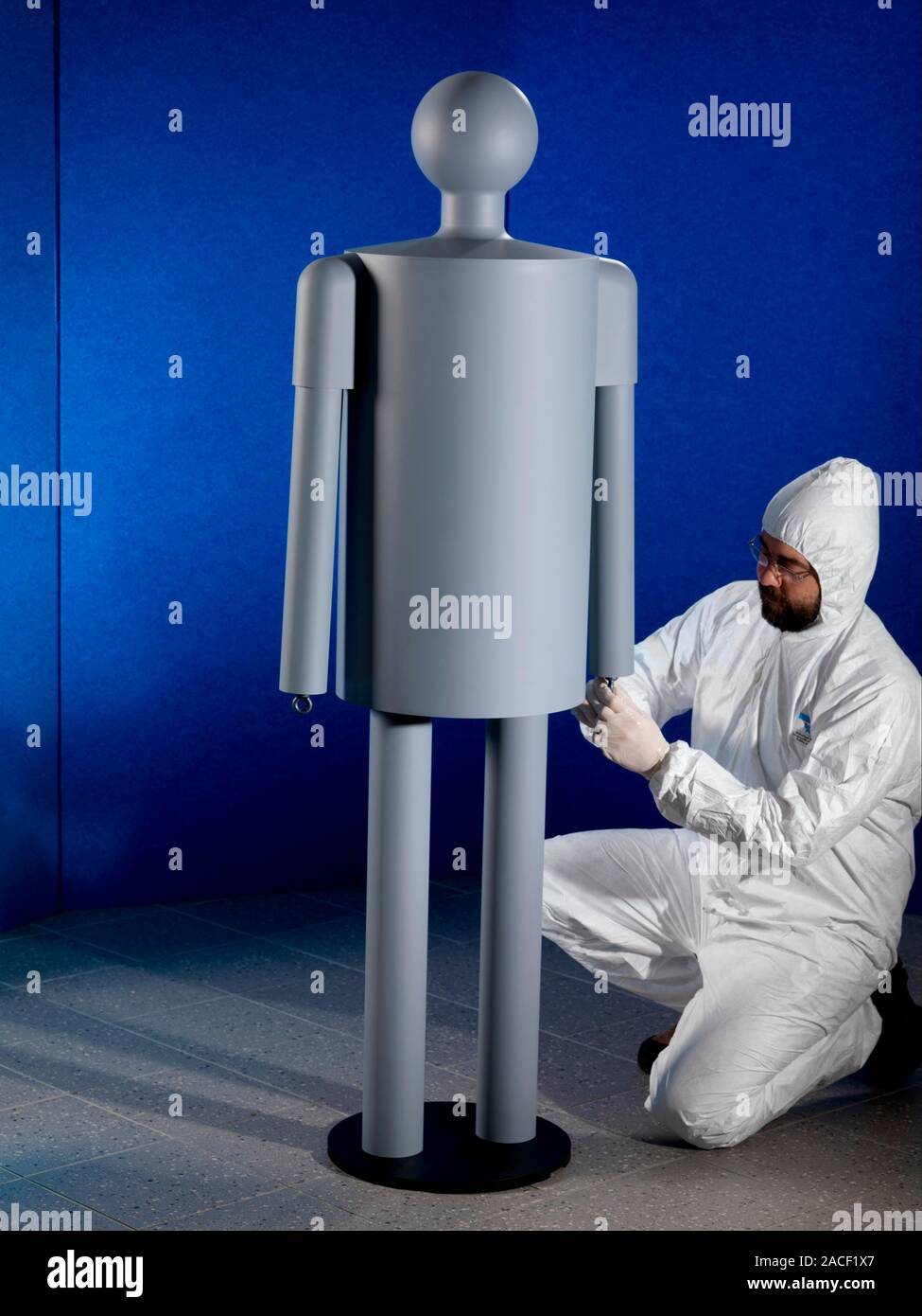 High precision dimensional model. Technician adjusting the National ...