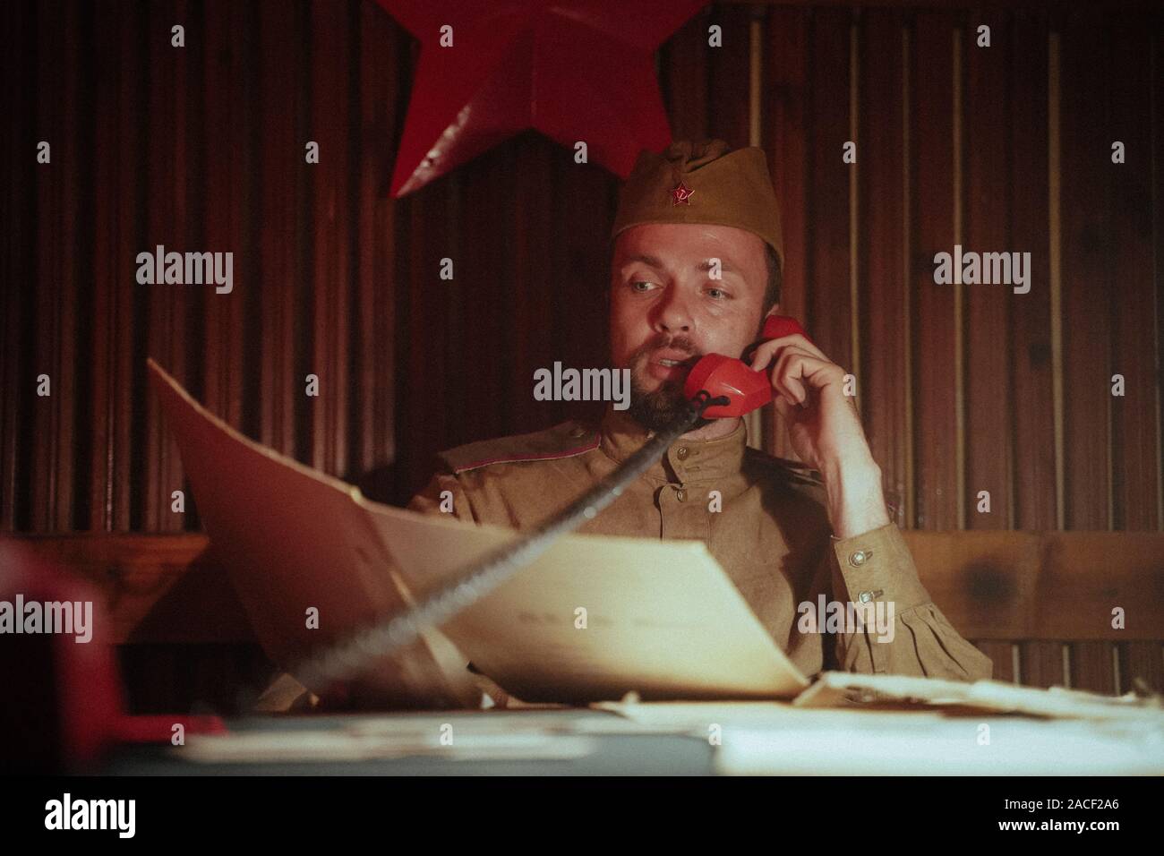Soviet times military Soldier with Phone in the headquarters bunker ...