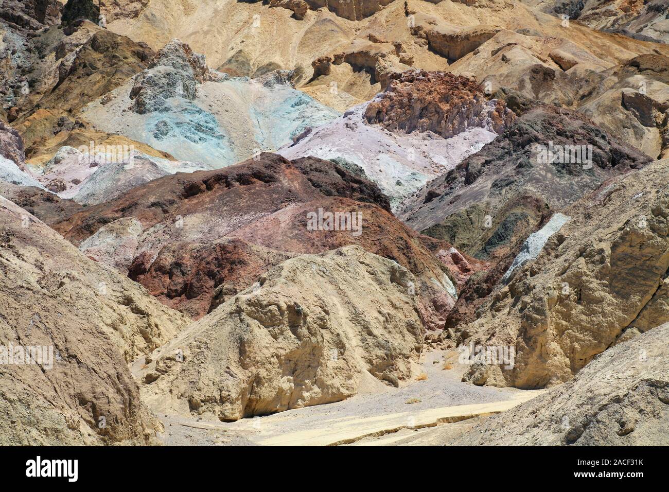 Volcanic deposits. Rocks coloured by various volcanic mineral deposits ...
