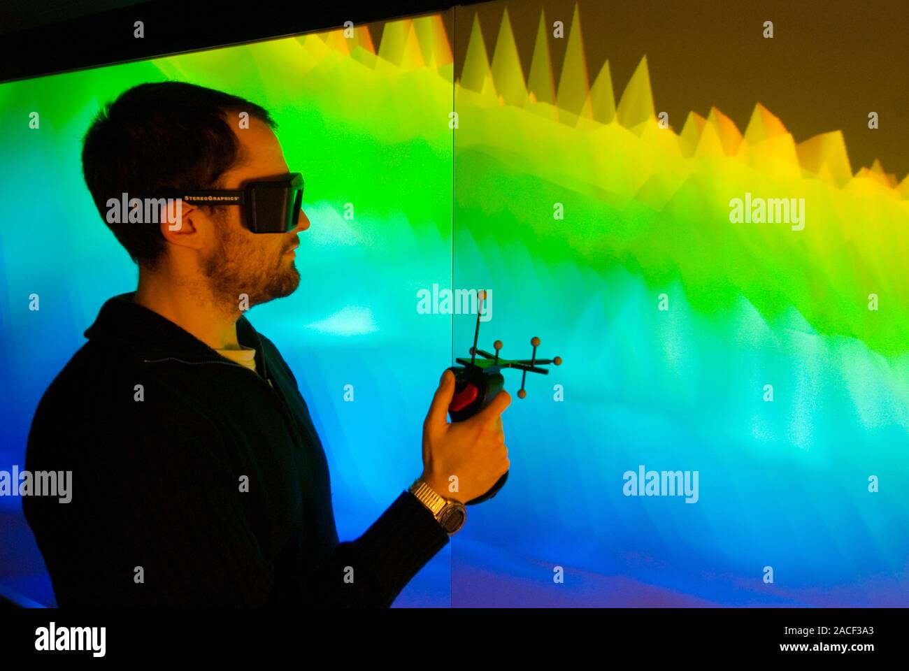 Virtual reality coastal erosion model. Researcher using a virtual ...