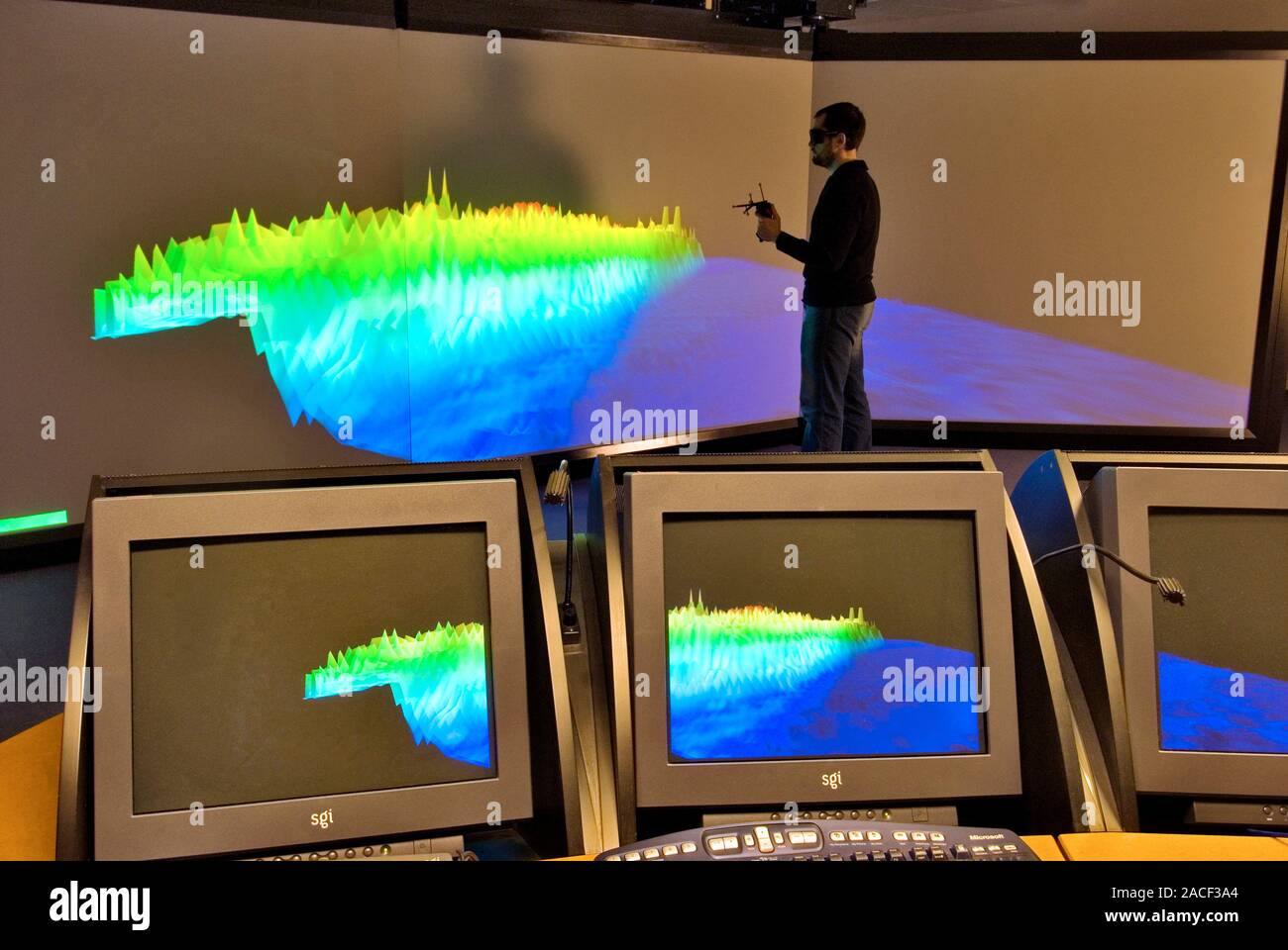 Virtual reality coastal erosion model. Researcher using a virtual ...