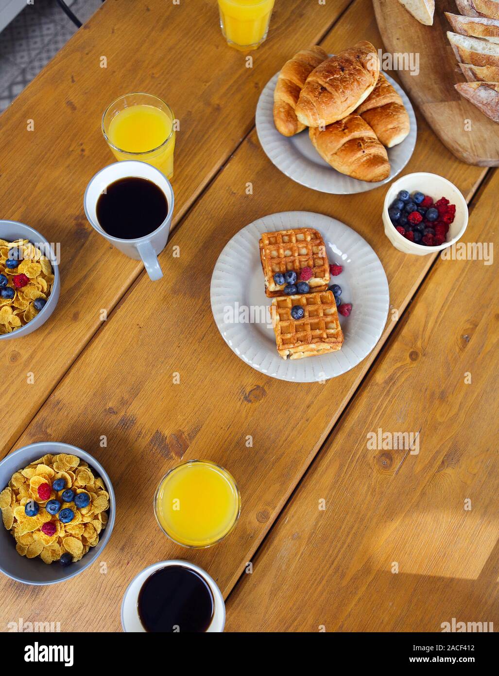 Breakfast on the wooden table. Top view Stock Photo - Alamy