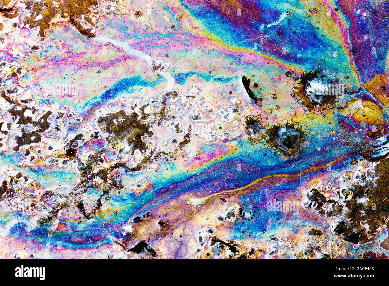 Interference pattern of colours caused by light reflected off a thin ...