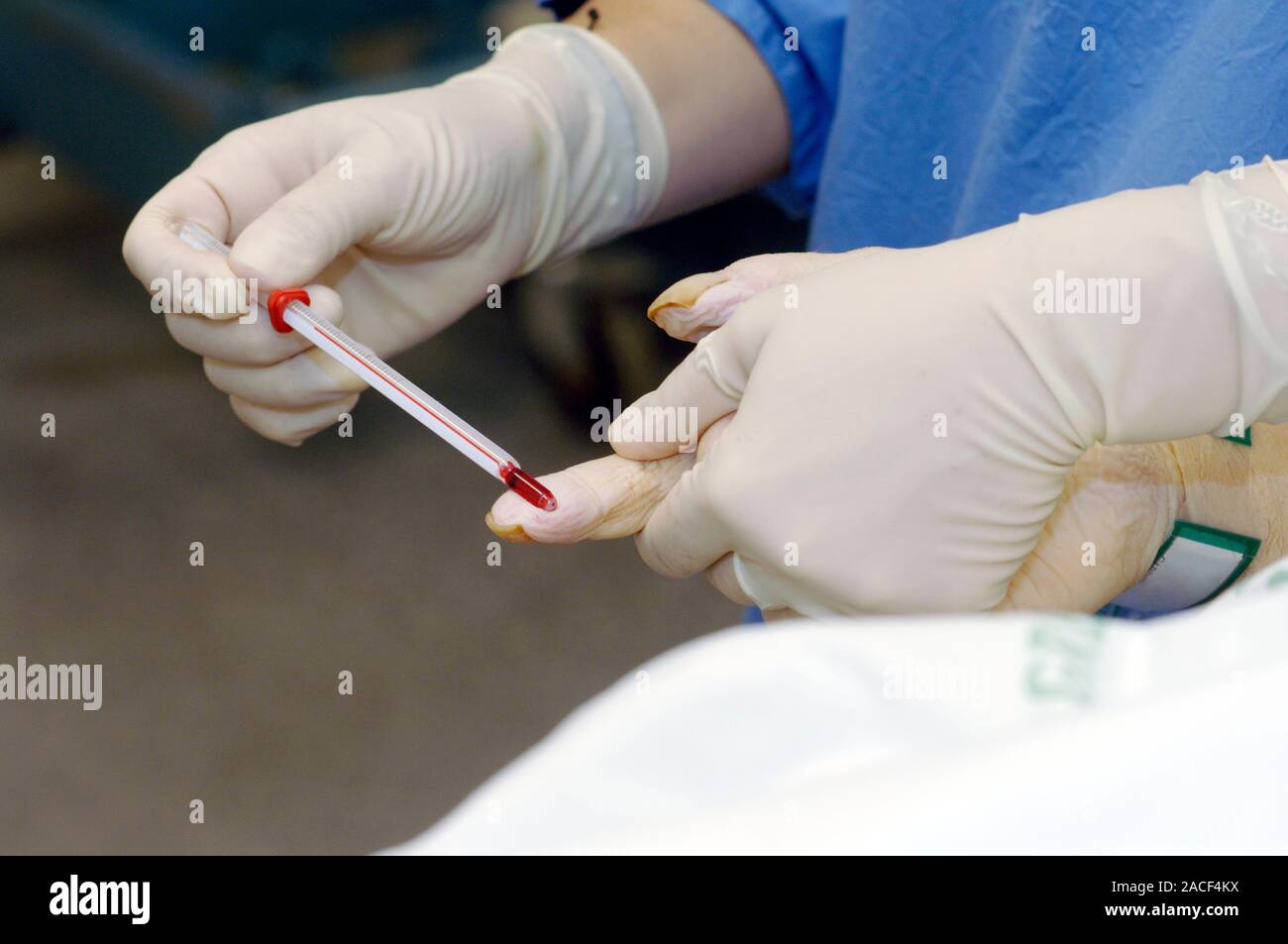 Forensics fingerprinting material testing. Researcher using a ...