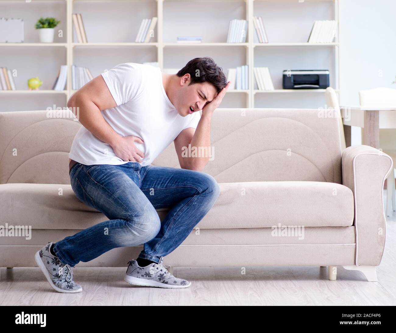 The man suffering from sick stomach and vomiting Stock Photo - Alamy