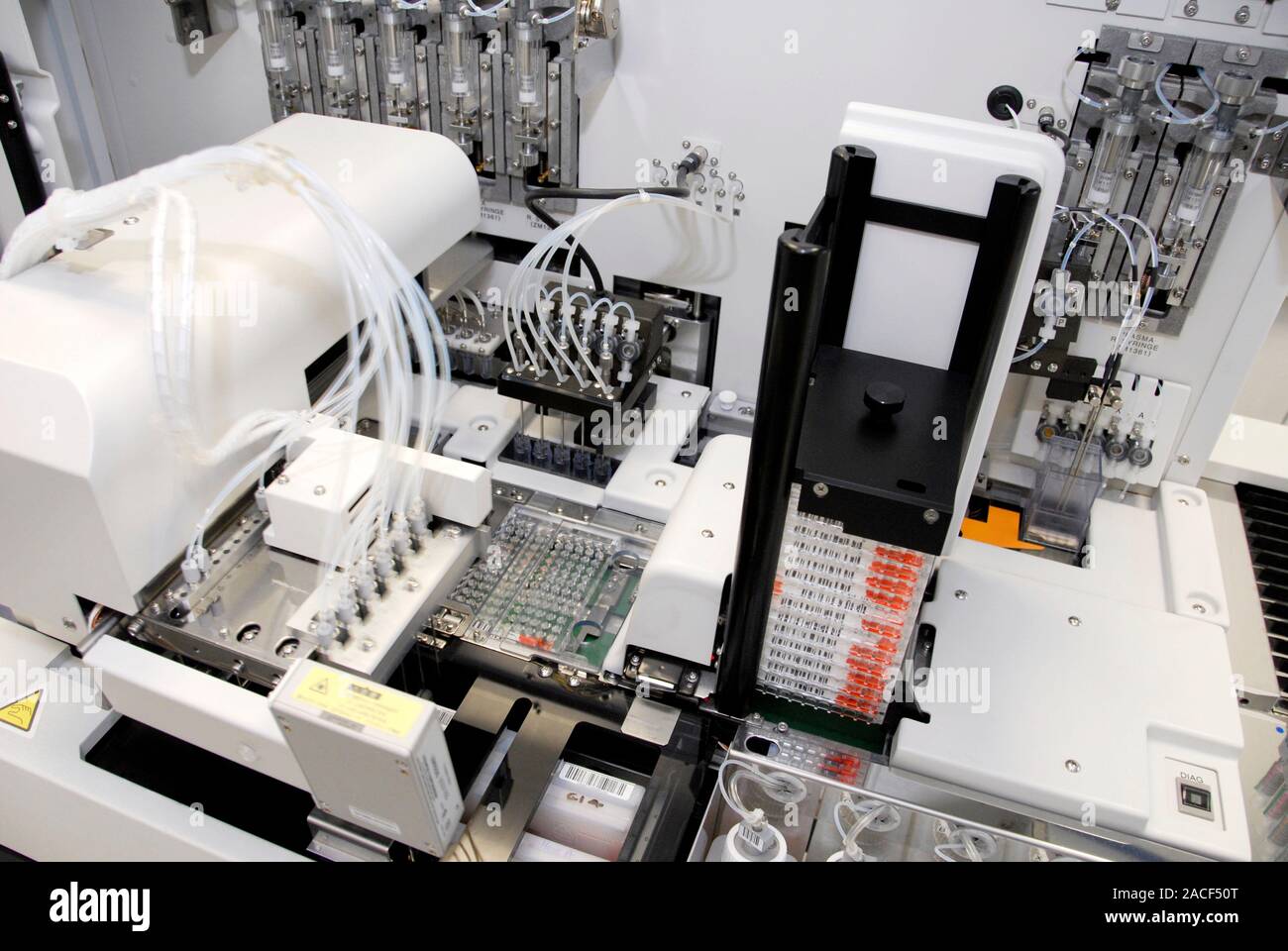 Blood typing machine in a haematology laboratory. This blood analyser ...