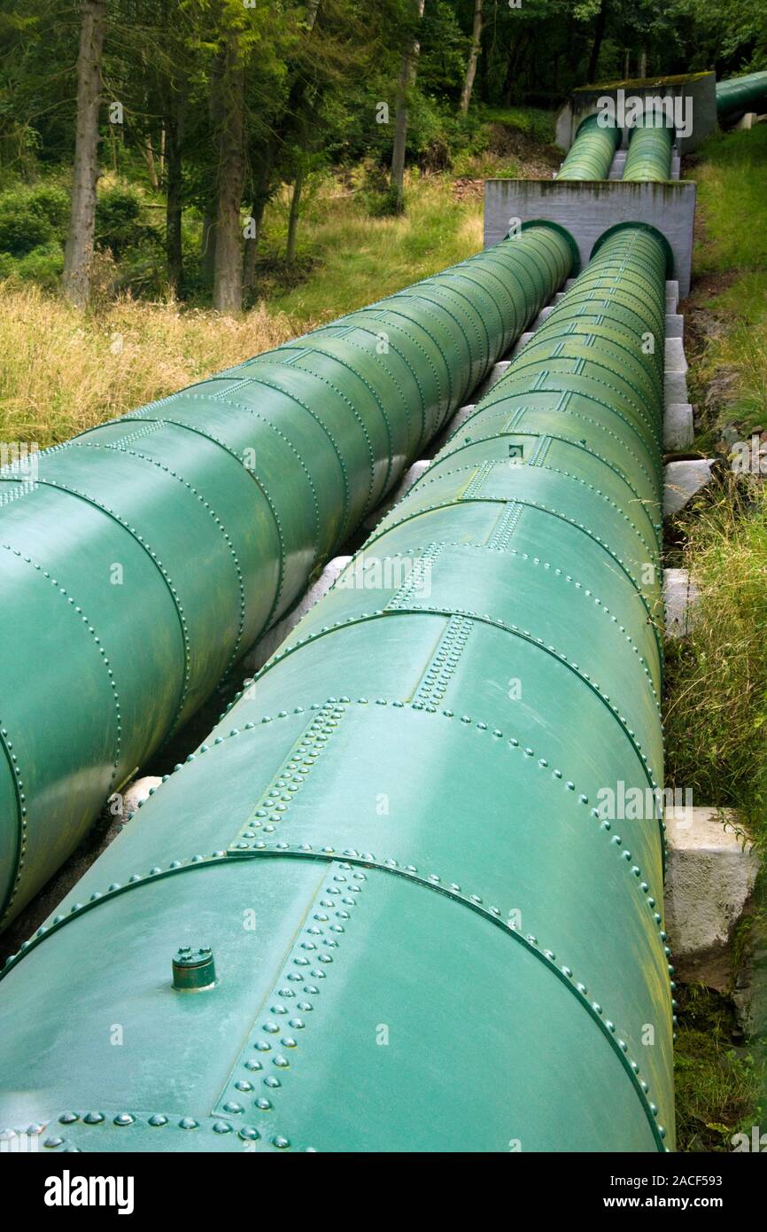 Hydroelectric pipeline. Water flowing down these pipes is used to dive ...