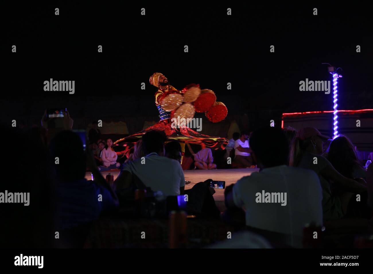 Light performance in Dubai desert, UAE Stock Photo - Alamy