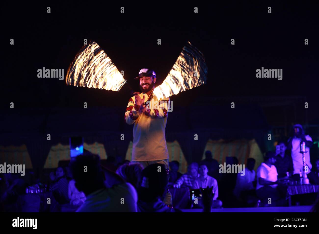 Light performance in Dubai desert, UAE Stock Photo - Alamy