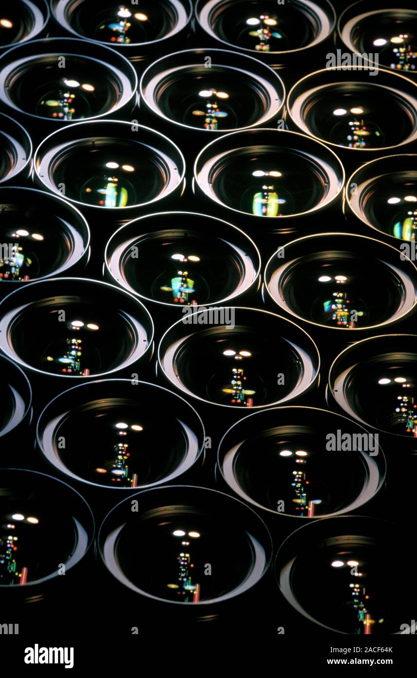 Camera lenses. Array of camera objectives facing upwards, showing their ...