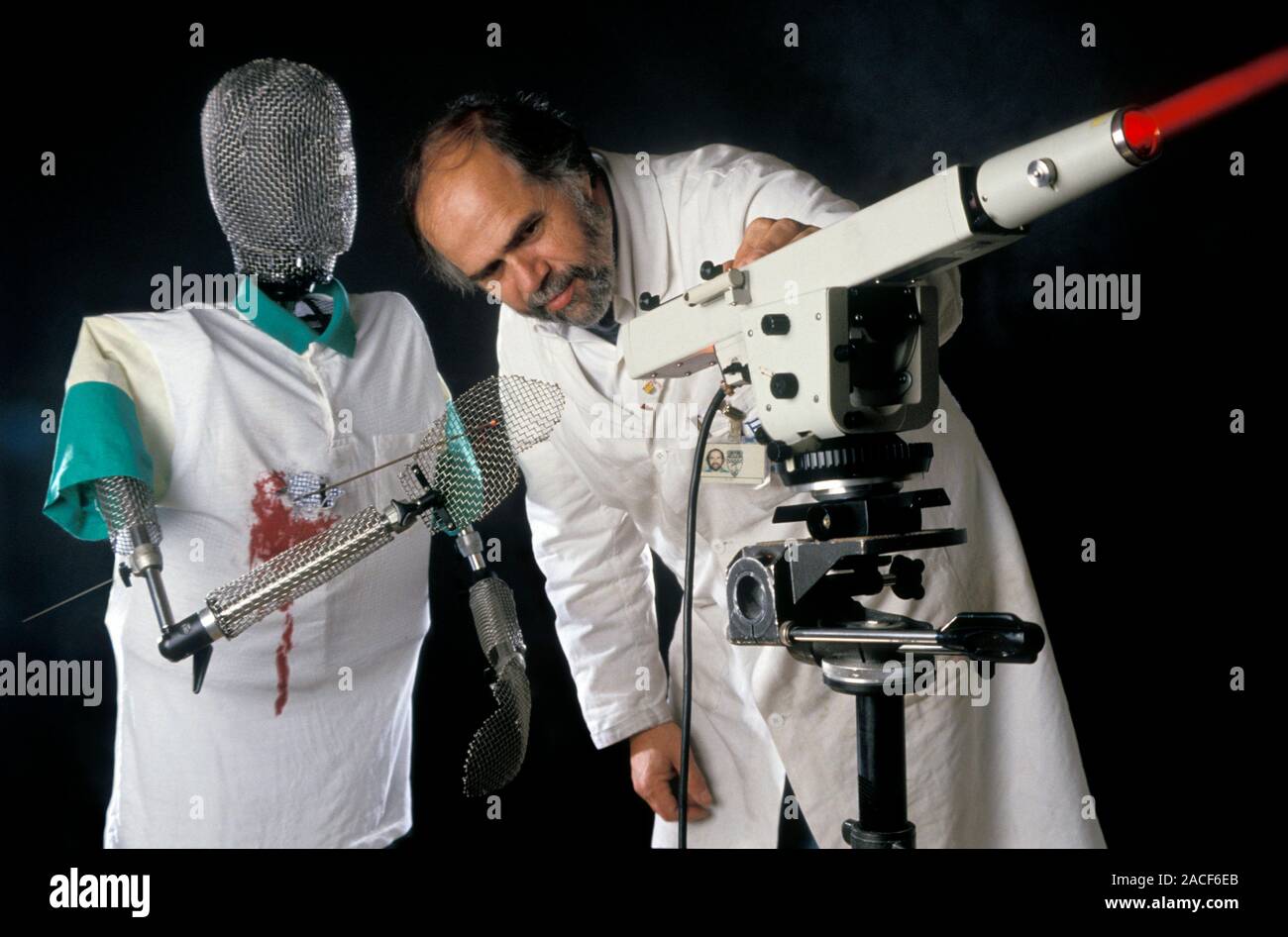 Forensic ballistics trajectory test. Laser being used to determine the ...