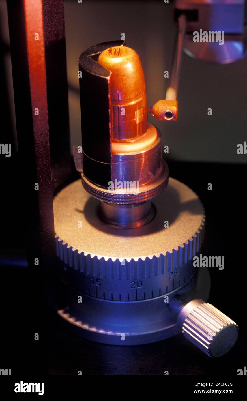 Forensic ballistics test. Crime scene bullet being examined by scanning ...
