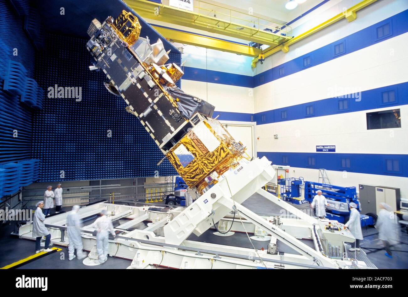ENVISAT satellite construction. Engineers assembling and constructing ...