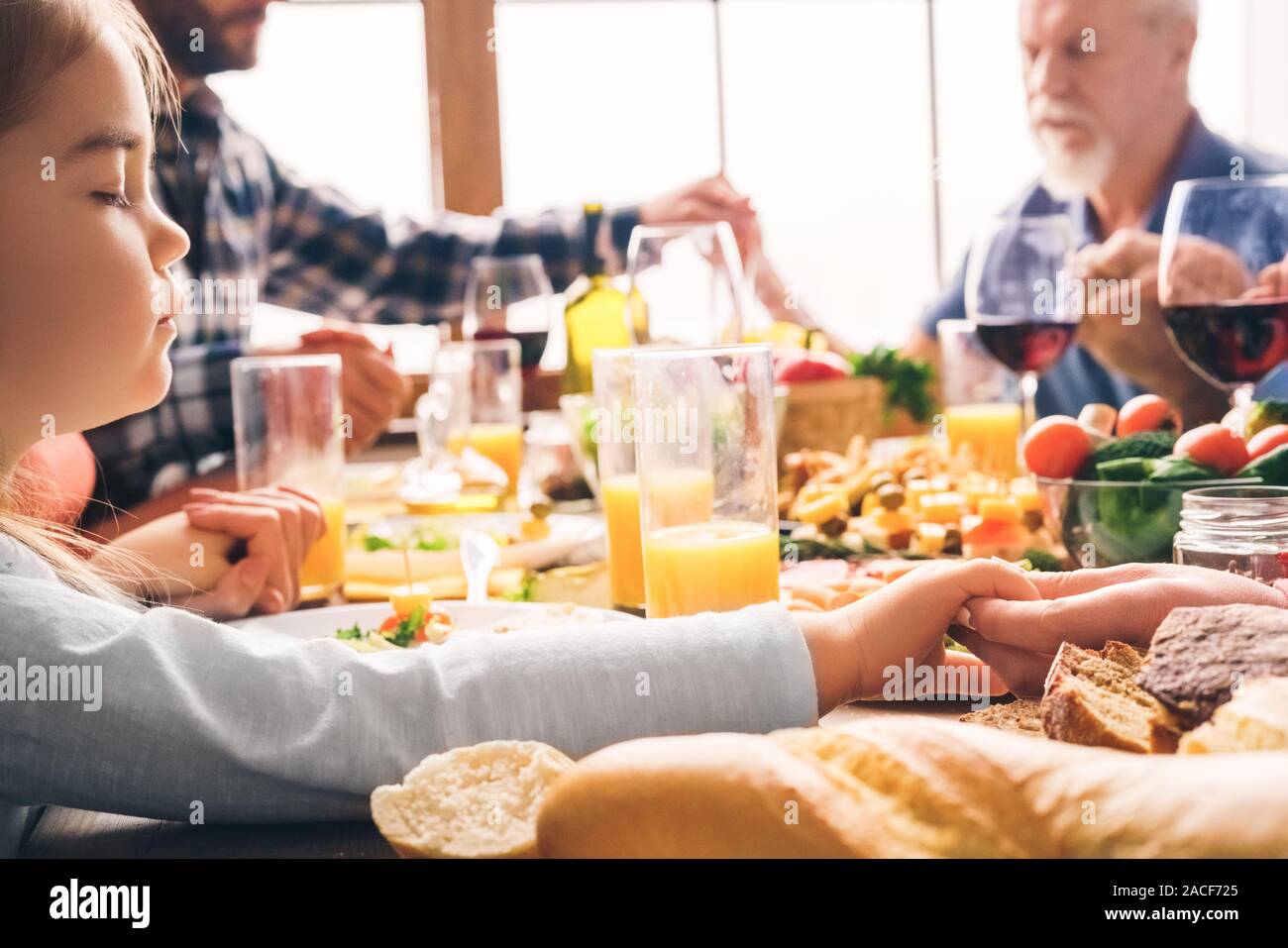 Adult child praying together hi-res stock photography and images - Alamy