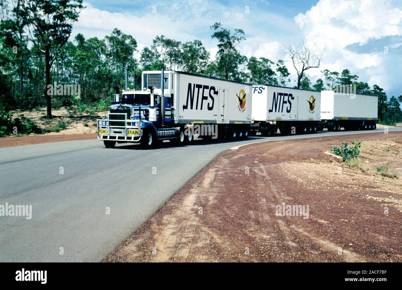 Road train, Australia. Road trains are long chains of lorry units ...