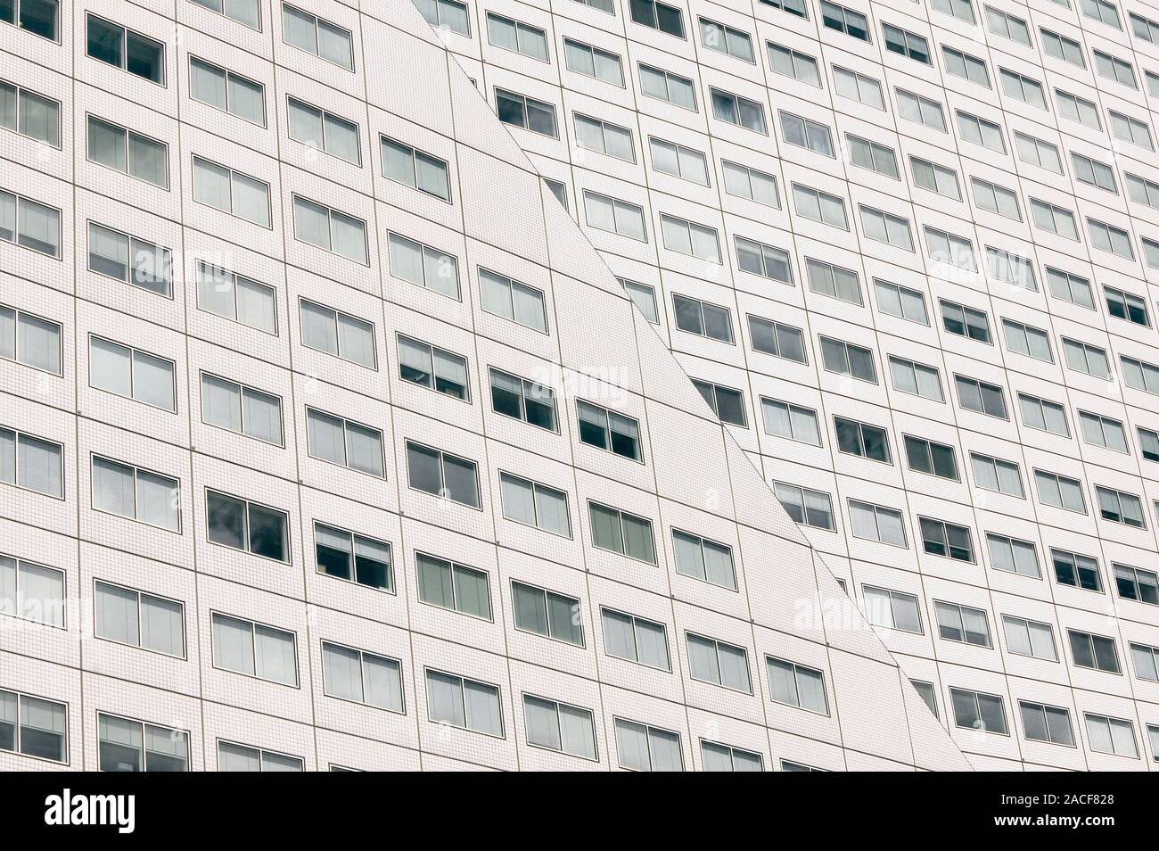 Office block windows. The design of a building's windows and the use of ...