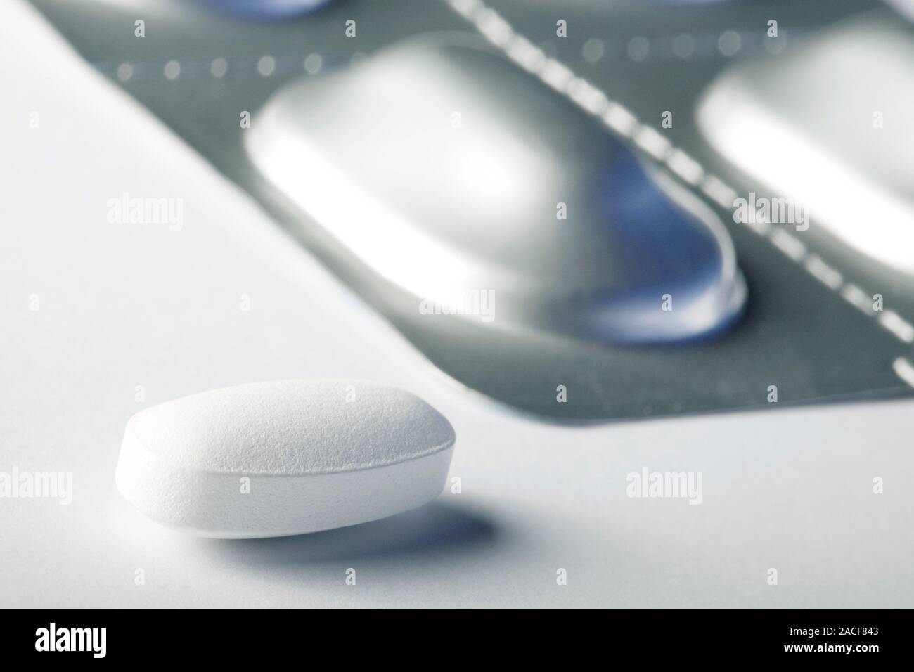 Amoxicillin antibiotic drug. Caplets and blisterpack packaging of the ...