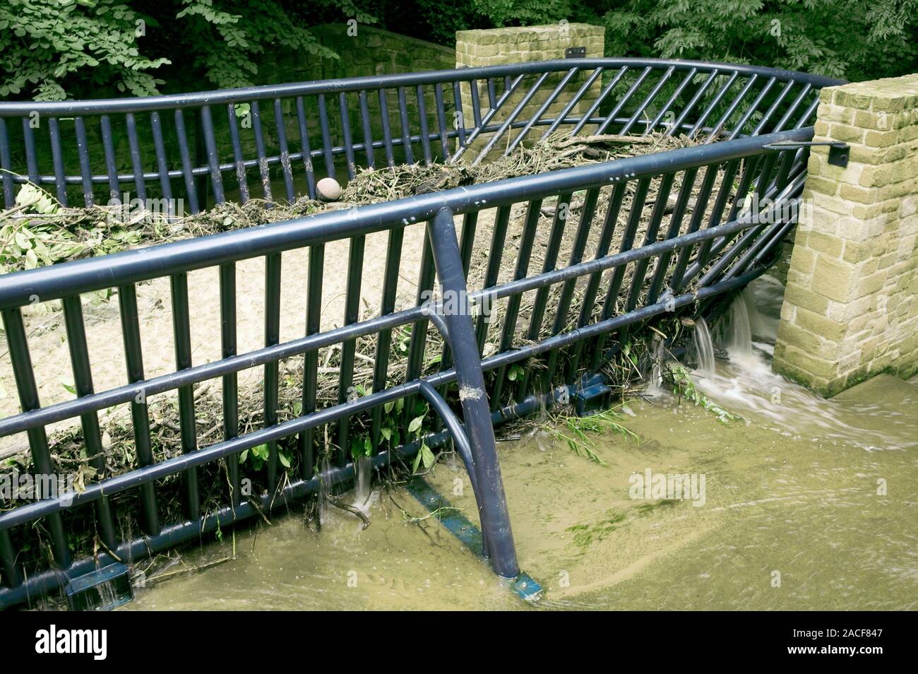 Flood barrier seen after a flood. This barrier serves to catch debris ...