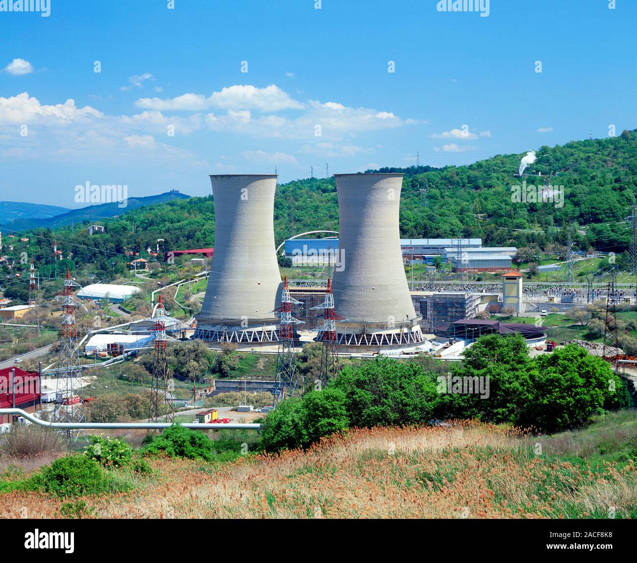 Geothermal power station. Cooling towers (centre) of the Centrale 2 ...
