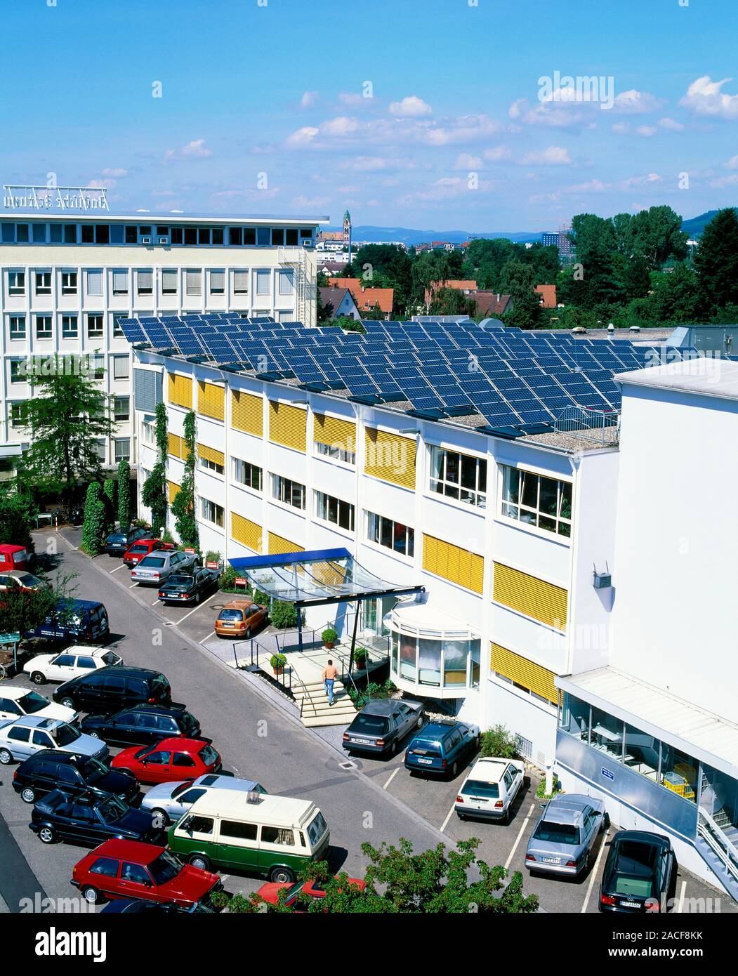 Rooftop solar panels. Arrays of photovoltaic cells on the roof of an ...