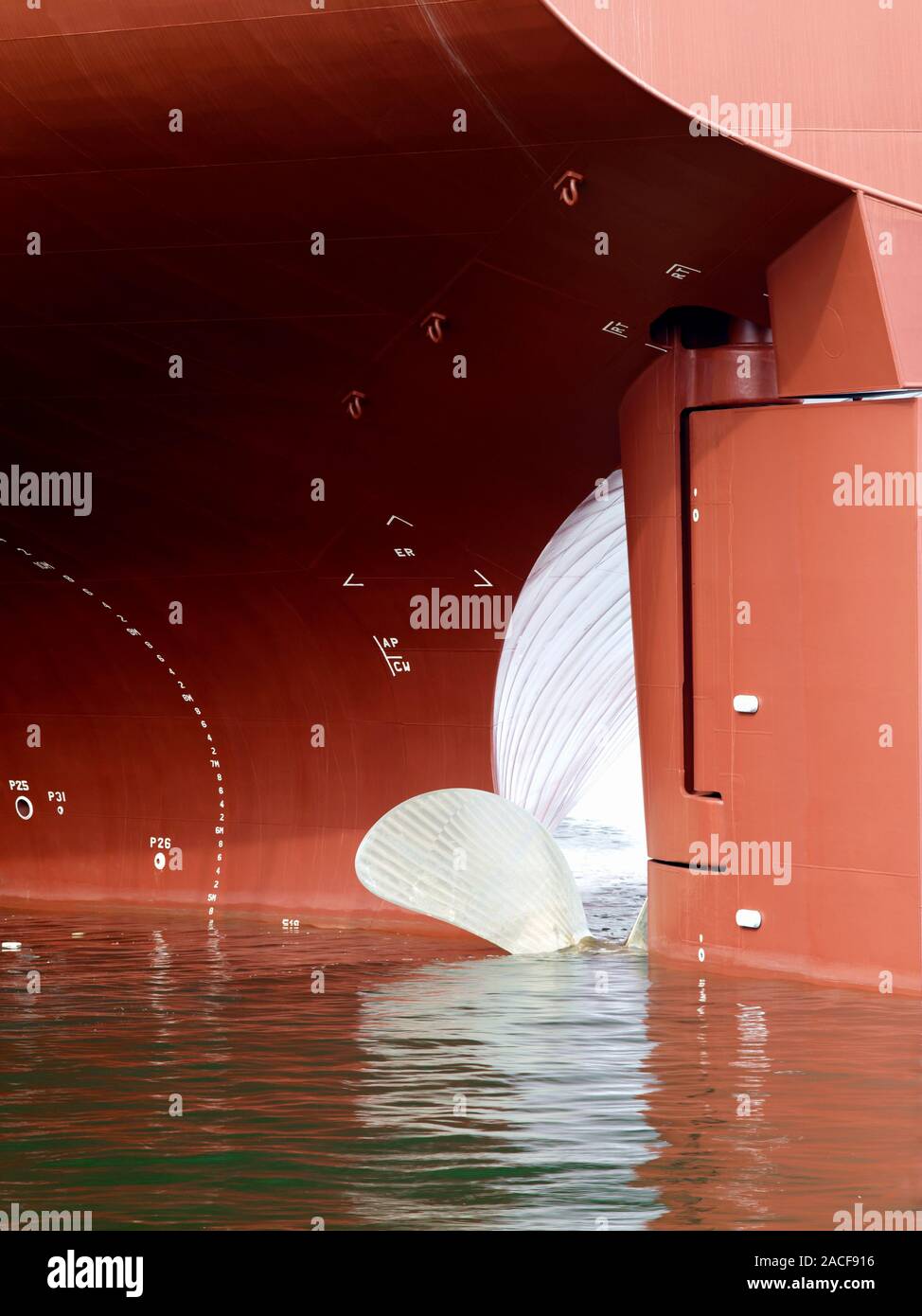 Crude oil tanker. Propellor blade (white, lower centre) and rudder ...
