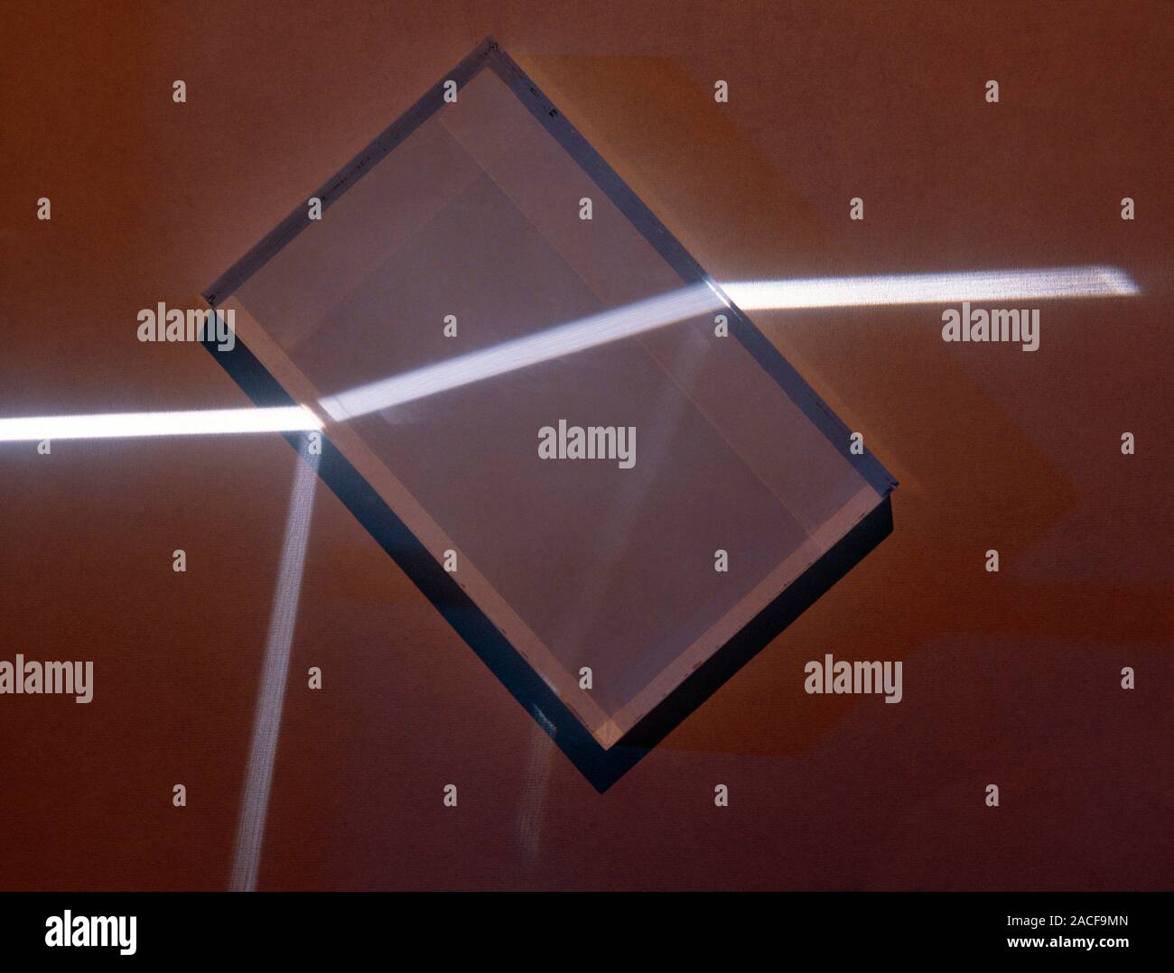 Refraction of light through a glass block. Reflections (near verical ...