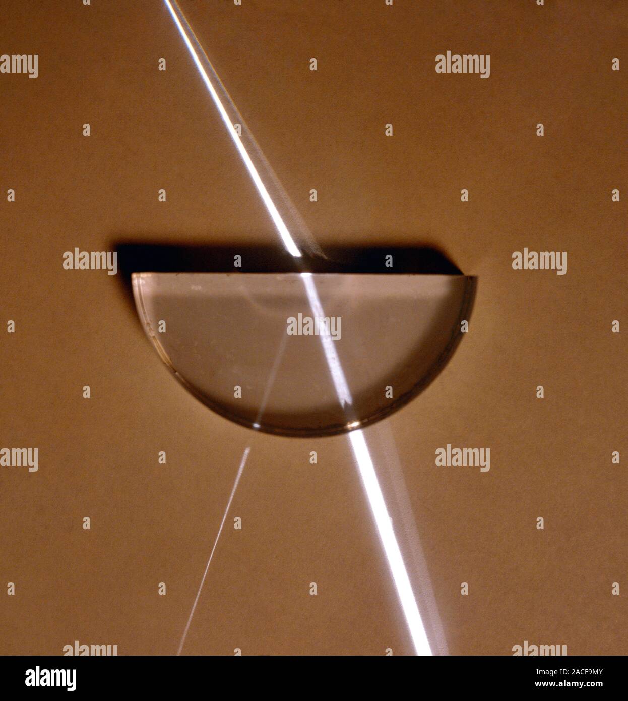 Refraction of light through a glass block. Light travels at different ...