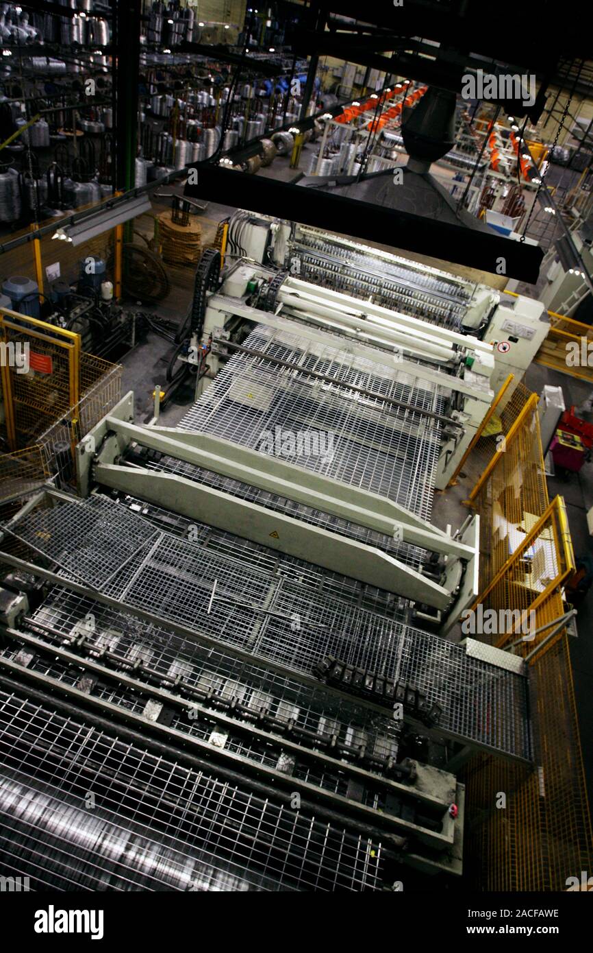 Security fencing production. Metal fences being made in a factory. This ...