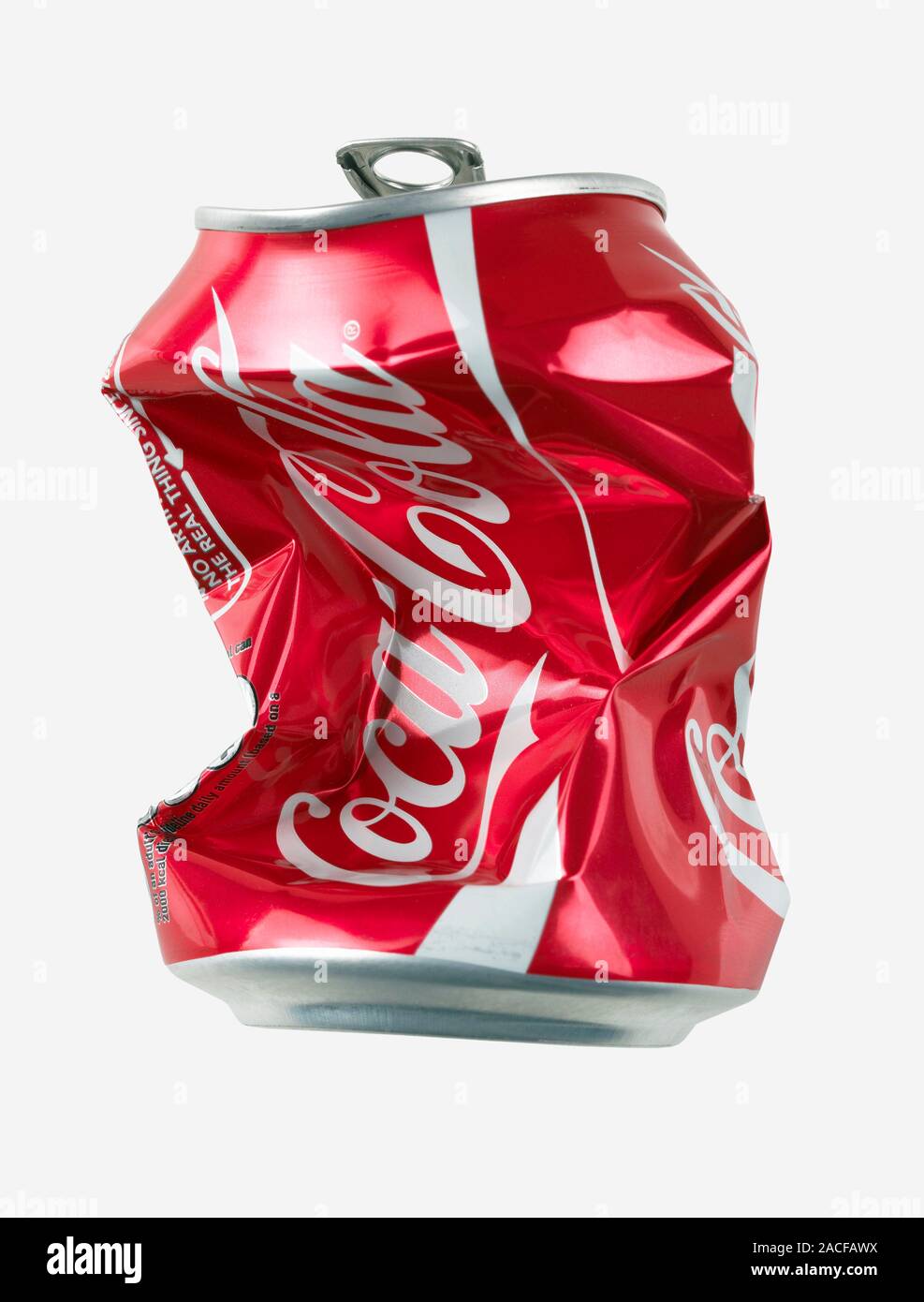 Crushed Coca Cola can cut-out against white background Stock Photo - Alamy