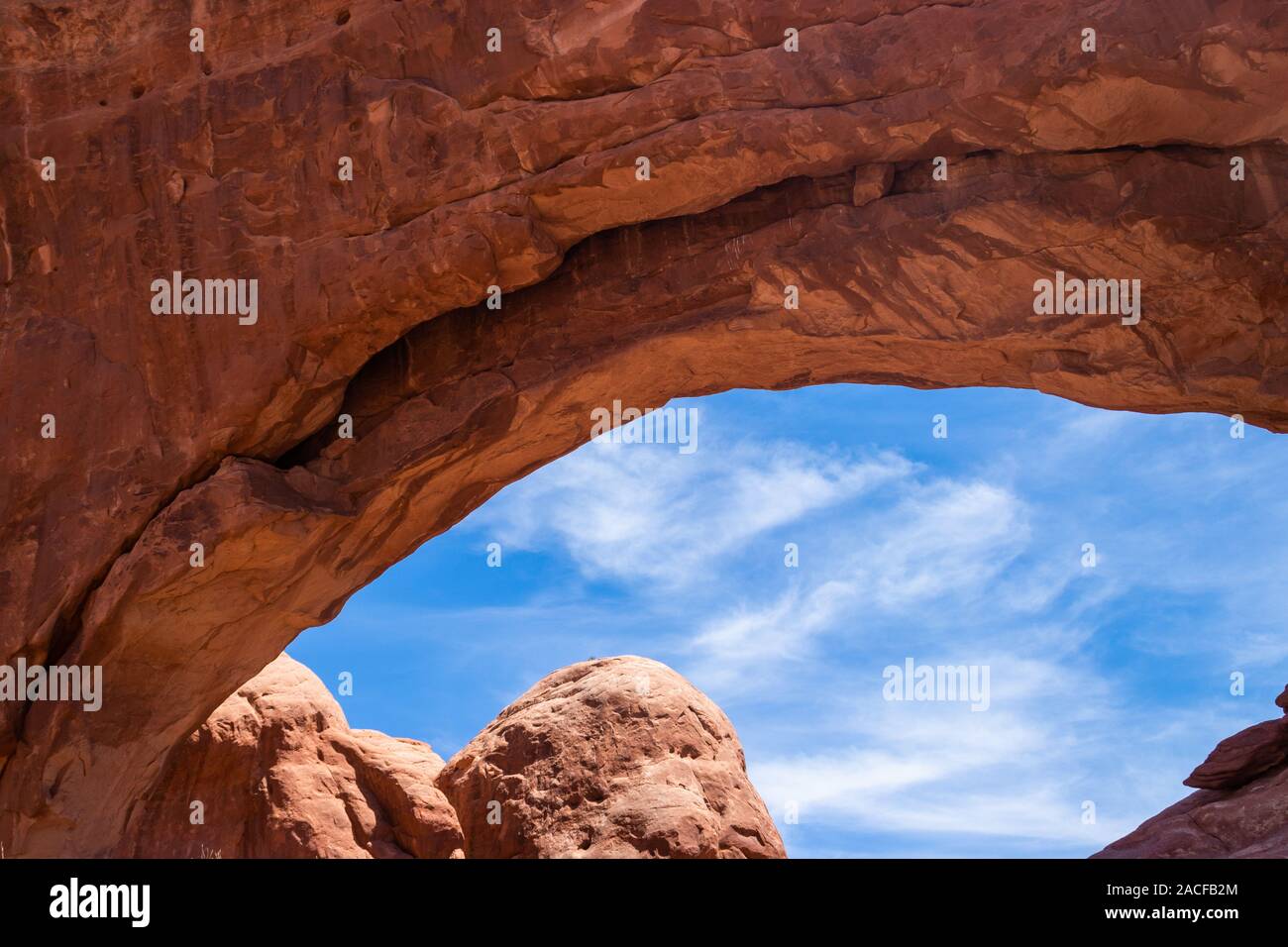 A view of a blue western sky through north window arch Stock Photo - Alamy