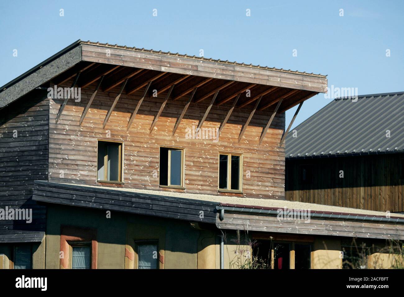 Ecological housing development, Bazouges-sous-Hede, France. The ...