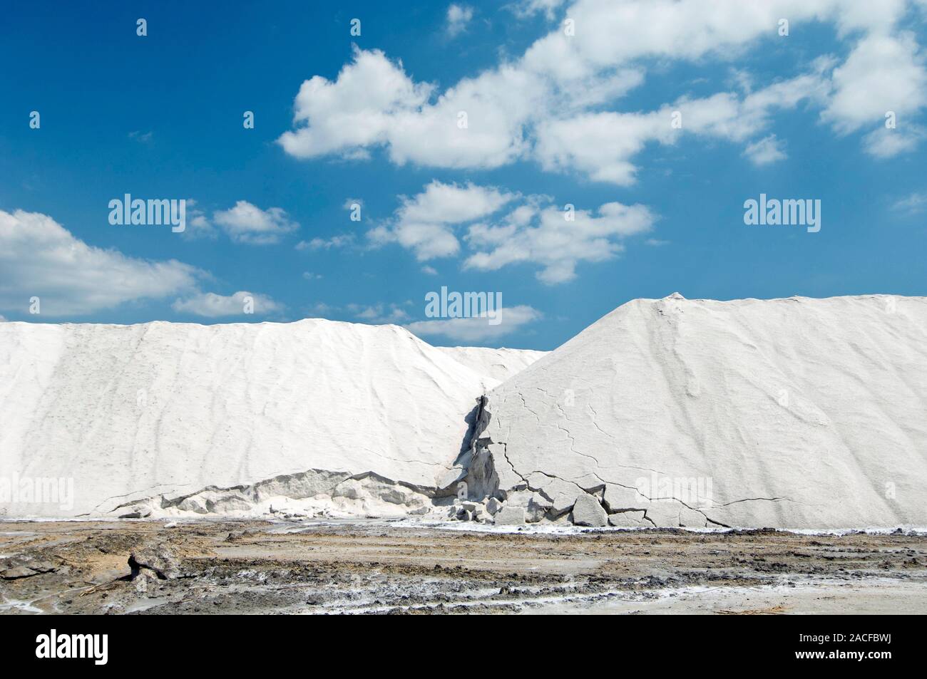 Salt works. Mounds of unrefined salt at a French salt works. This ...