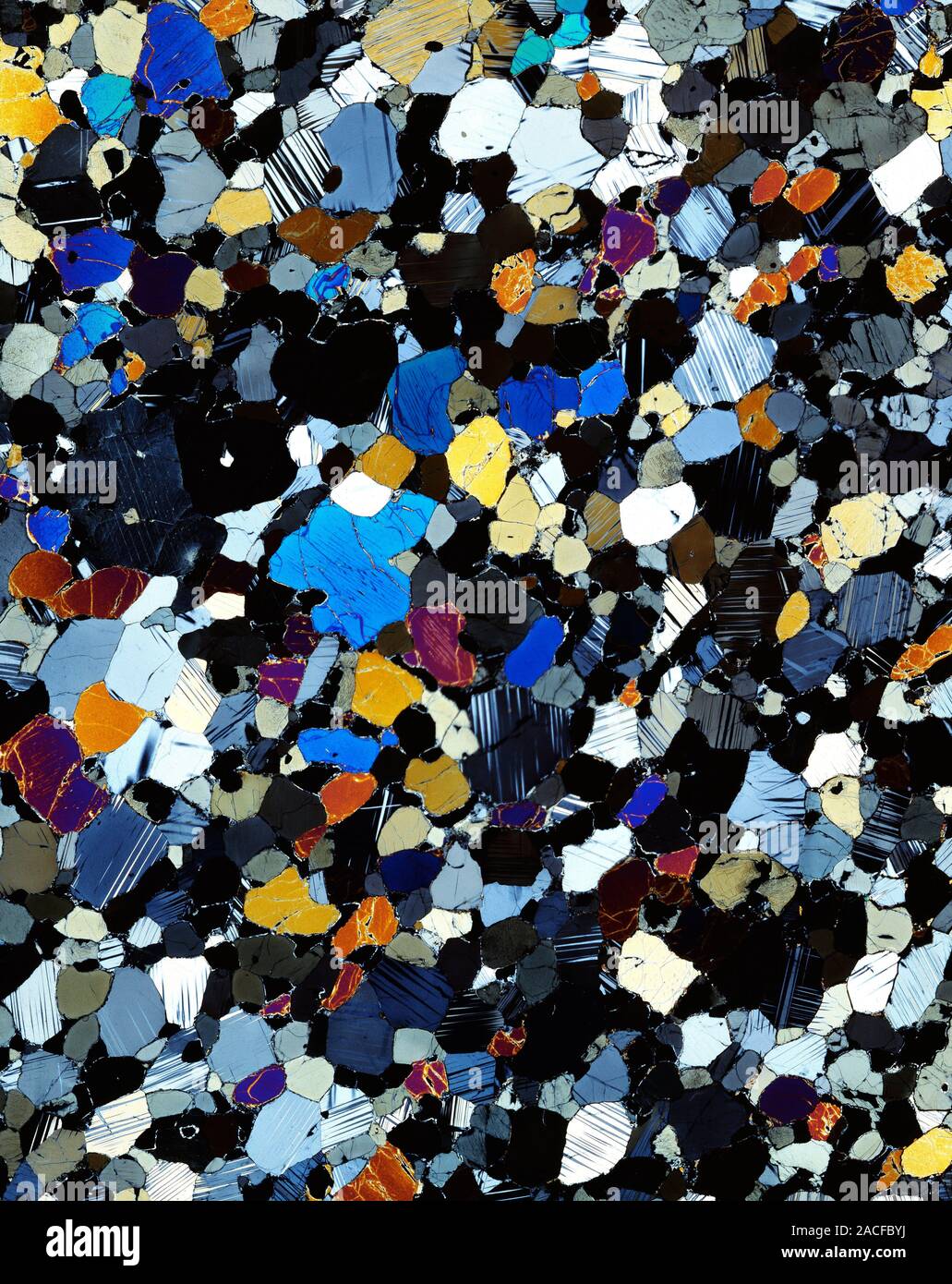 Granulite mineral. Polarised light micrograph of an alkaline granulite ...