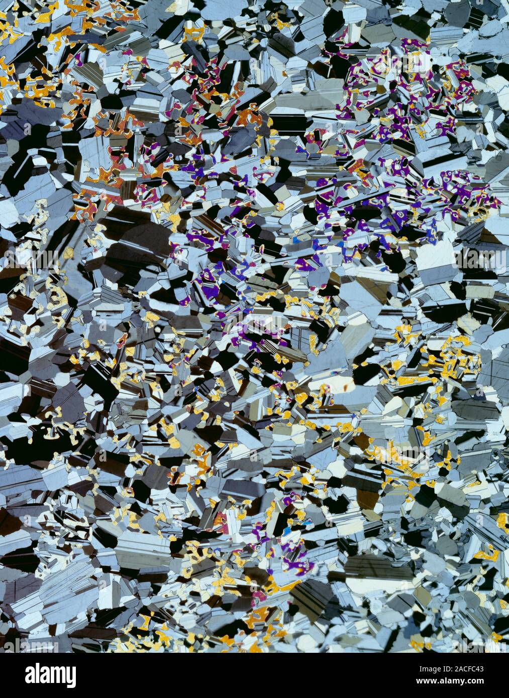 Norite rock. Polarised light micrograph of norite, a basic igneous rock ...