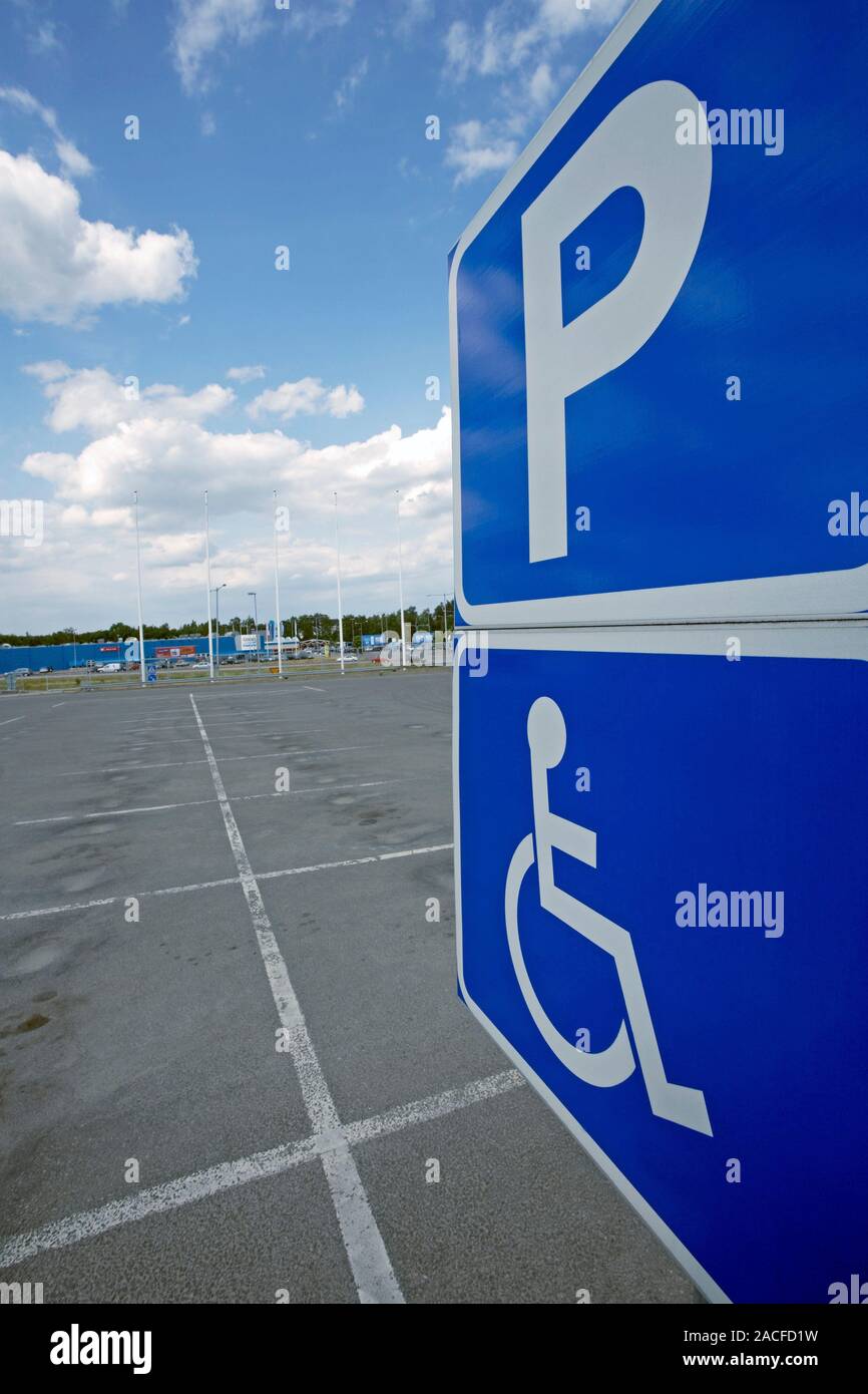 Disable parking sign in an empty car park. Photographed in Sweden Stock ...