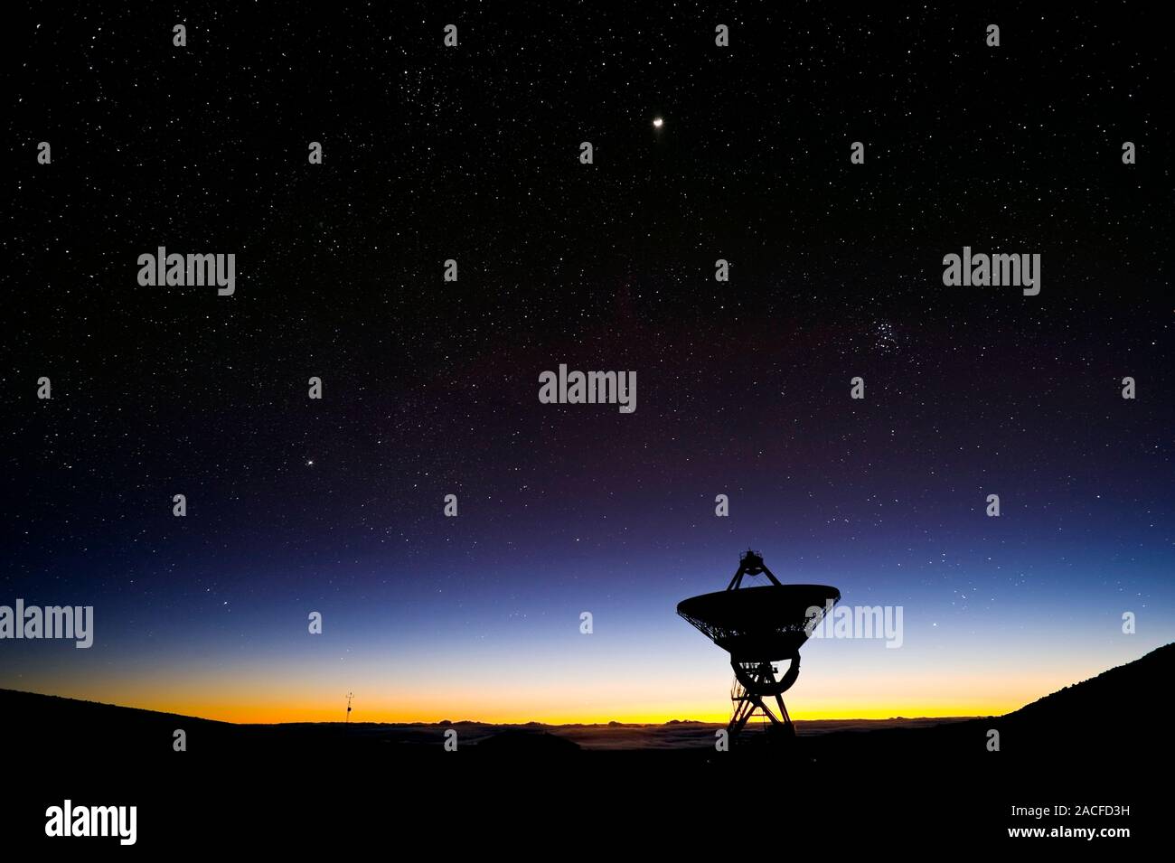 Very Long Baseline Array (VLBA) radio telescope at night. This 25-metre ...