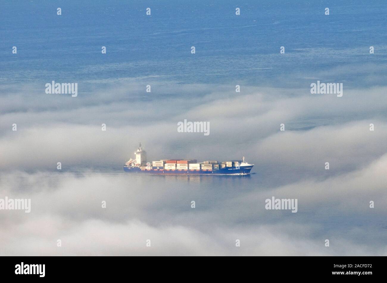 Container ship in fog at Gibraltar Bay Stock Photo - Alamy