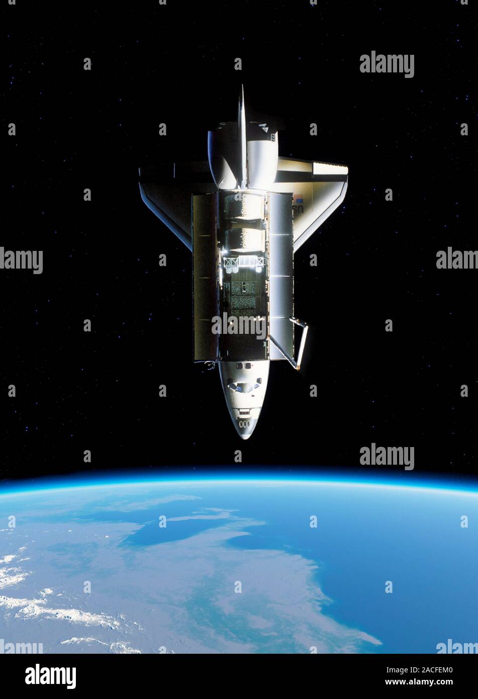 Space Shuttle Challenger, computer artwork. Two satellites are being ...