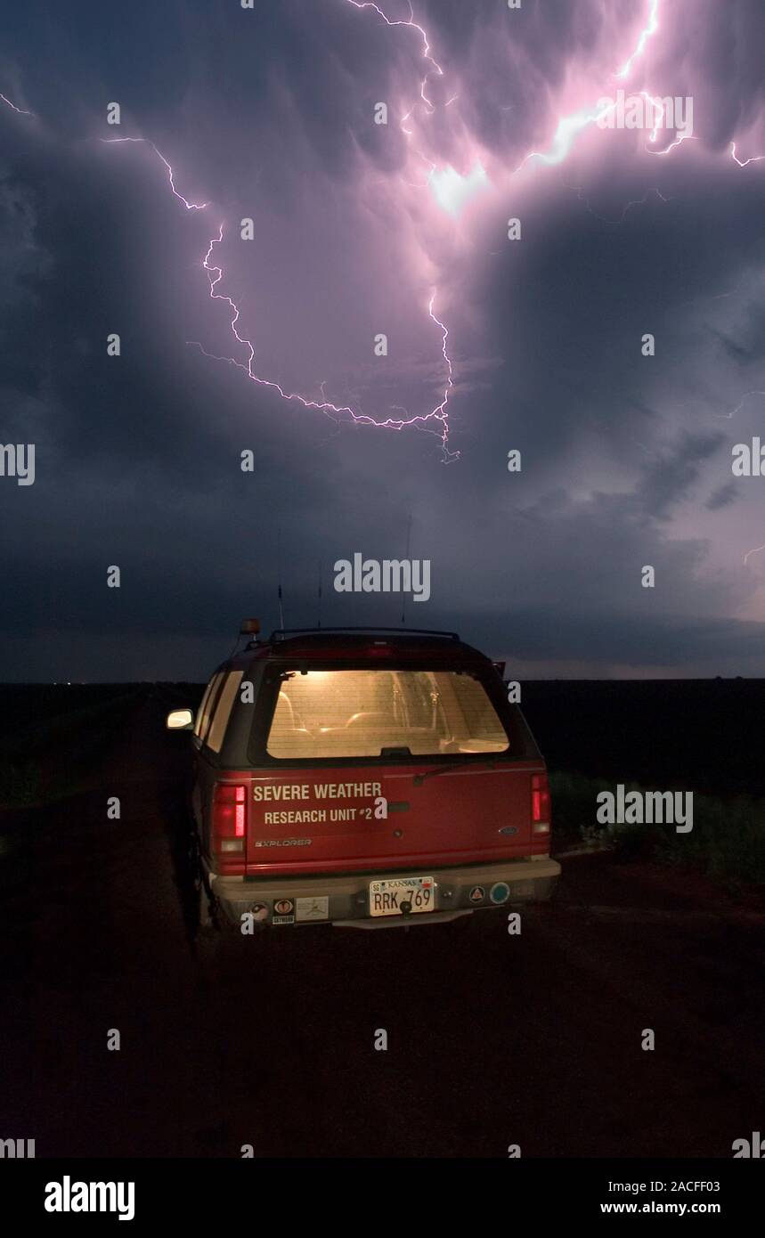 Storm chasers' van in front of a severe thunderstorm in Kansas, USA ...