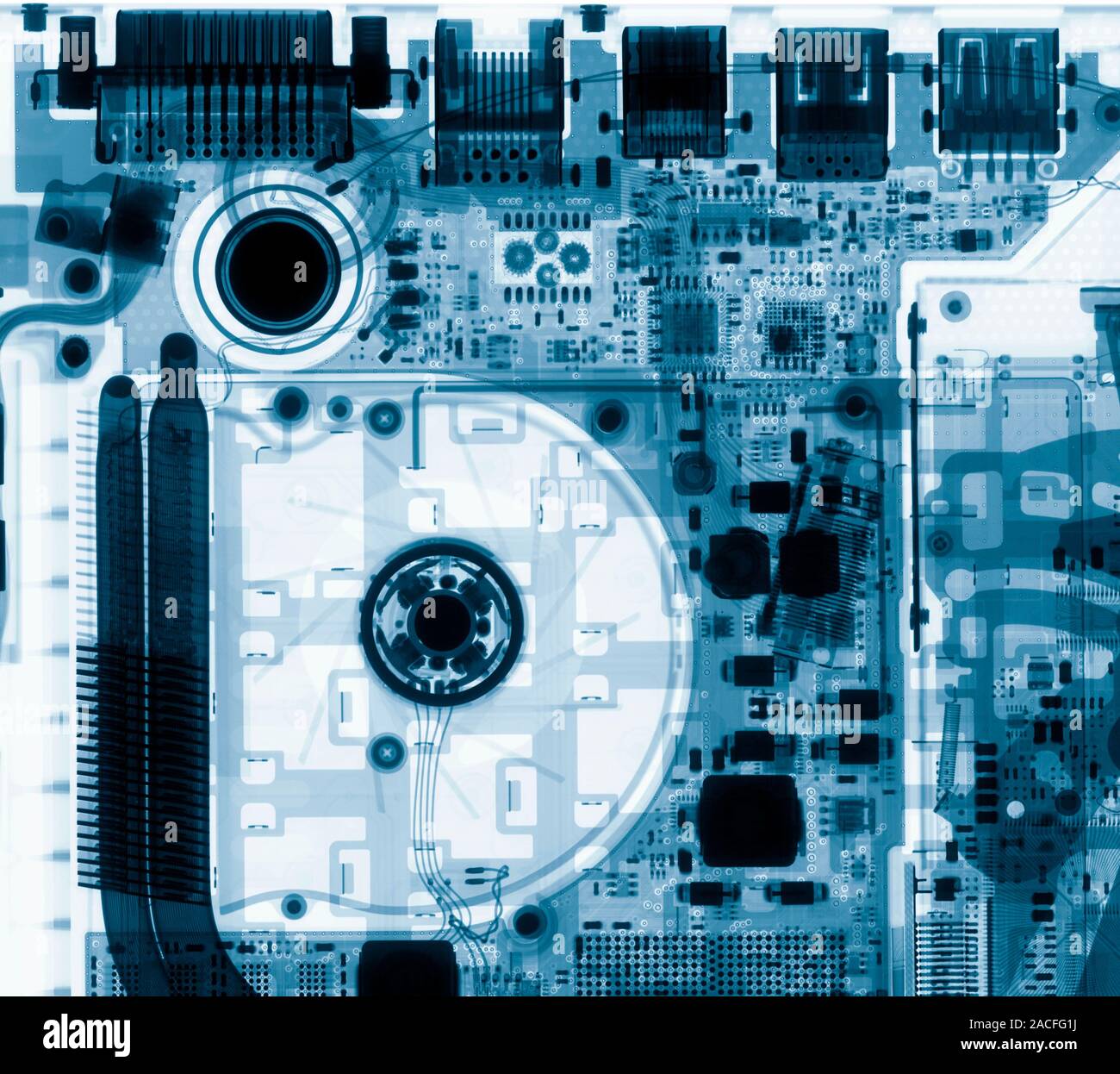 Laptop ports. Coloured X-ray of port sockets (top) at the back of a ...