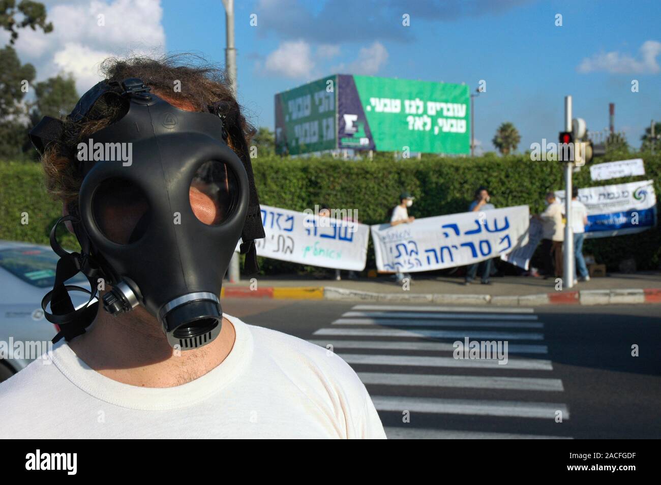Air pollution protest. Man wearing a gas mask at a protest against air ...
